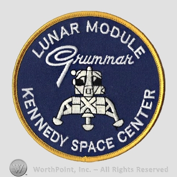 Mark with The text "LUNAR MODULE Grumman KENNEDY | #977147